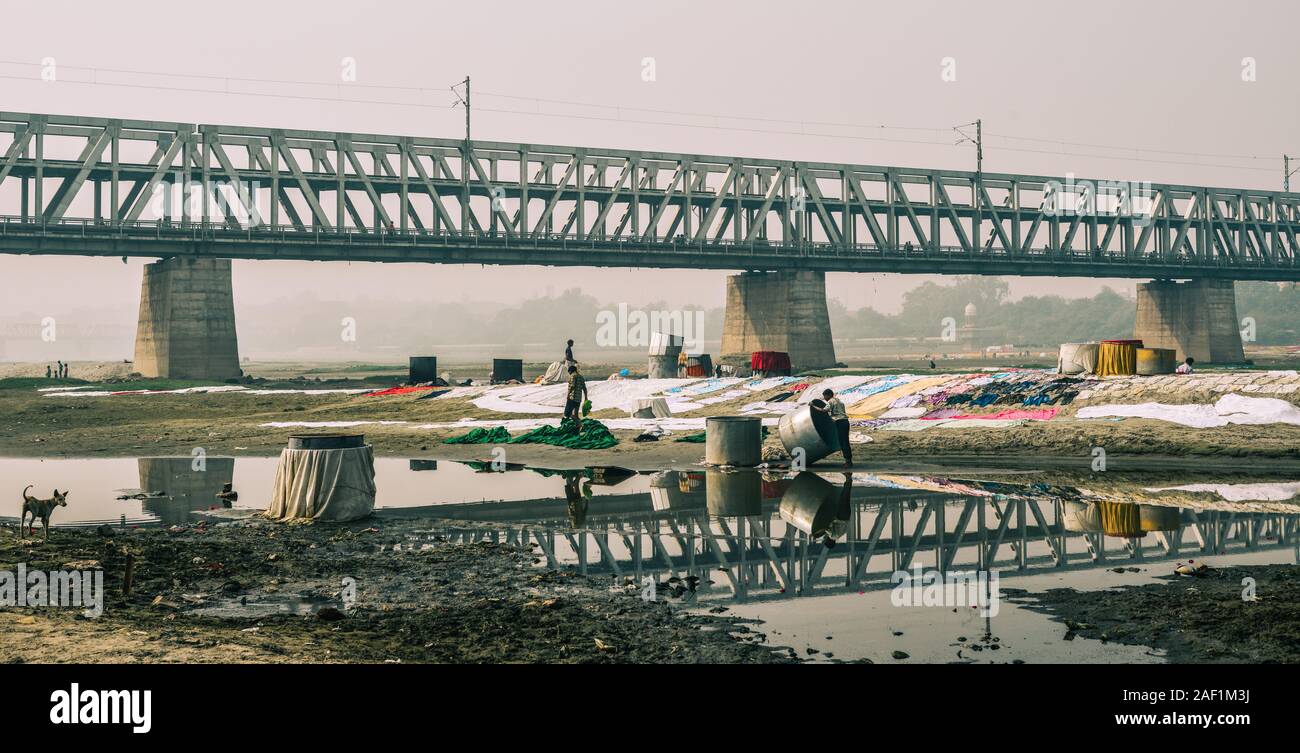 Agra, India - Nov 12, 2017. Steel bridge with Yamuna River at misty day ...