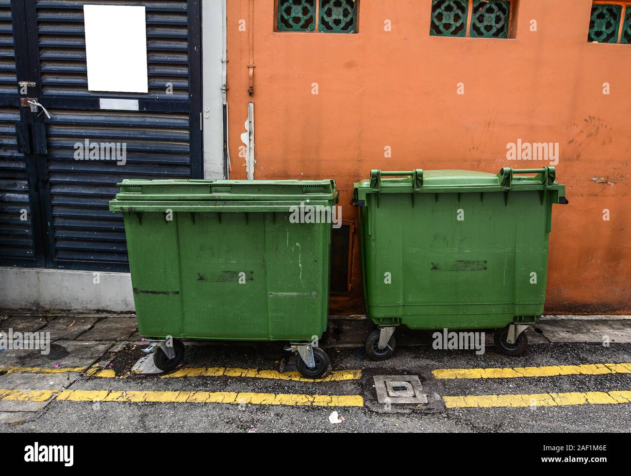 Old metal garbage containers on the street, trash dumpsters Stock Photo ...