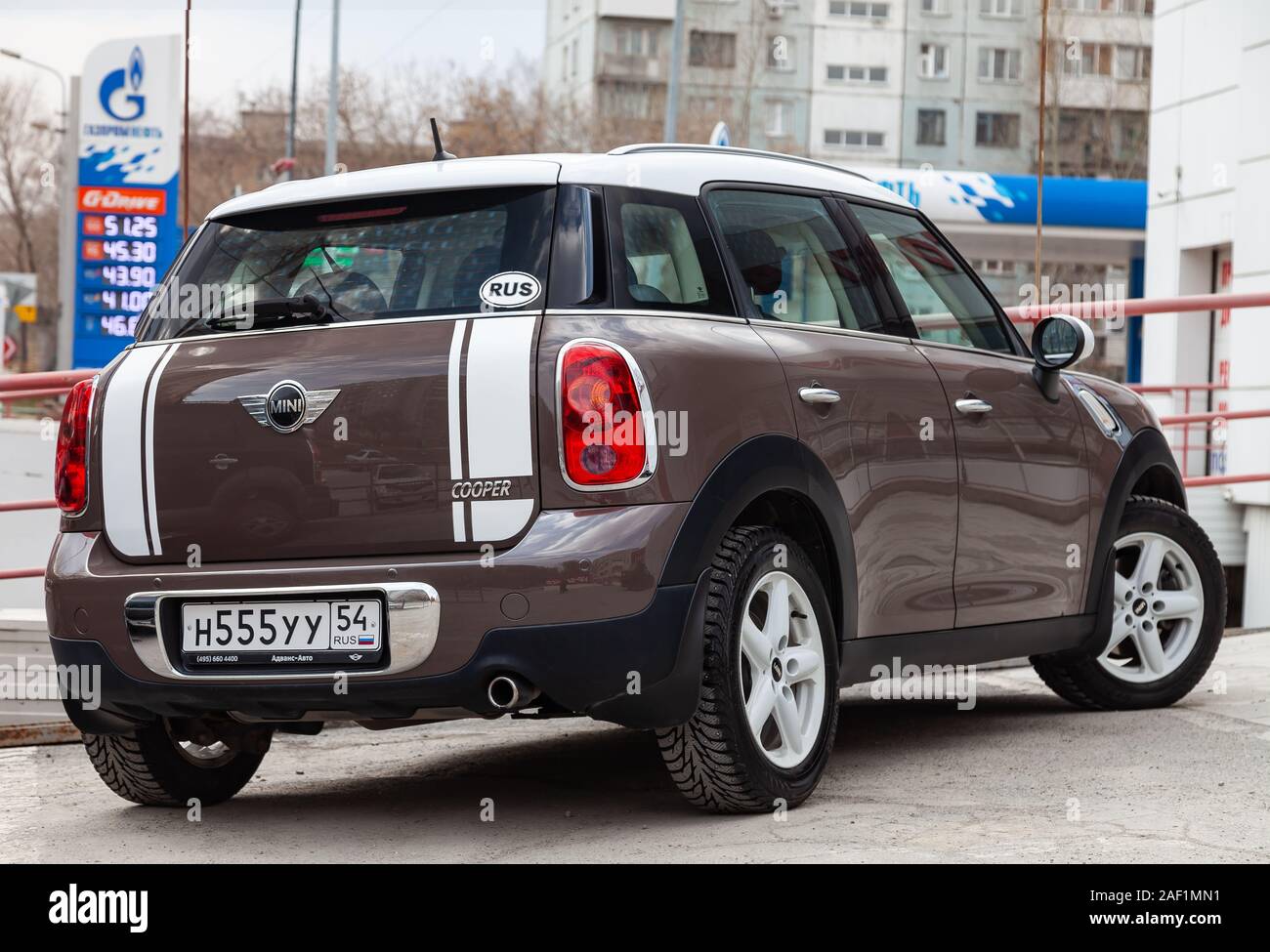 Novosibirsk, Russia - 06.26.2019: An expensive car, a female model of a ...