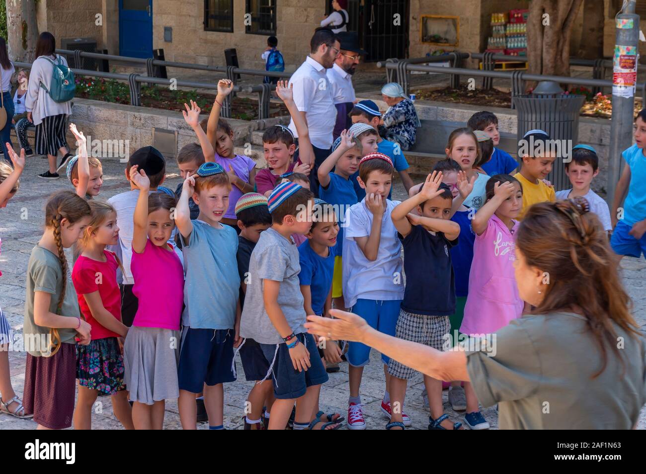 Jewish children playing on the streets of the old city in the Jewish ...
