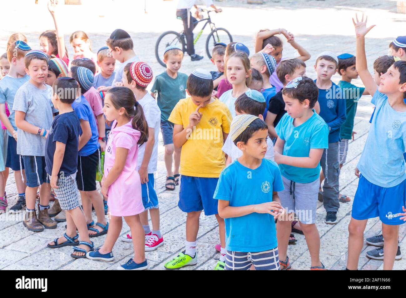 Jewish children playing on the streets of the old city in the Jewish ...