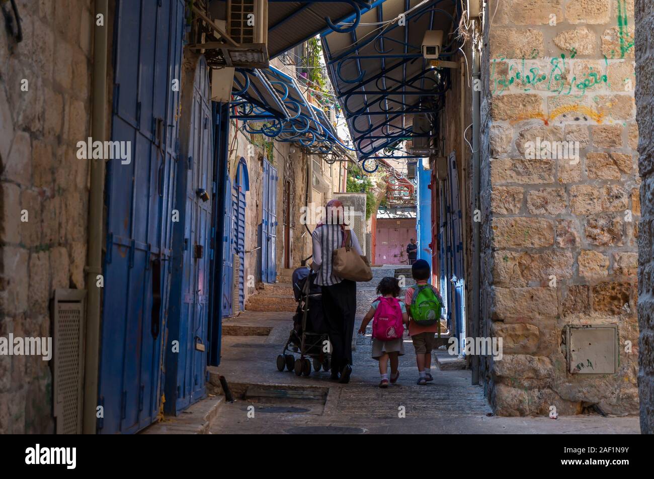 Jewish children playing on the streets of the old city in the Jewish ...