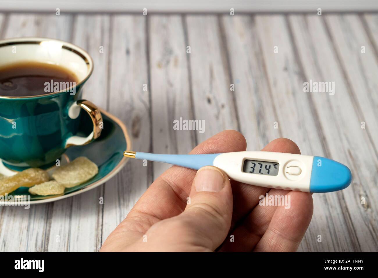 Ginger tea and thermometer hi-res stock photography and images - Alamy