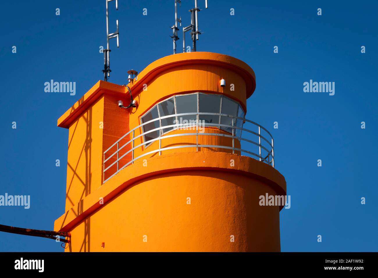 Orange lighthouse at Hvalnes, Iceland Stock Photo - Alamy