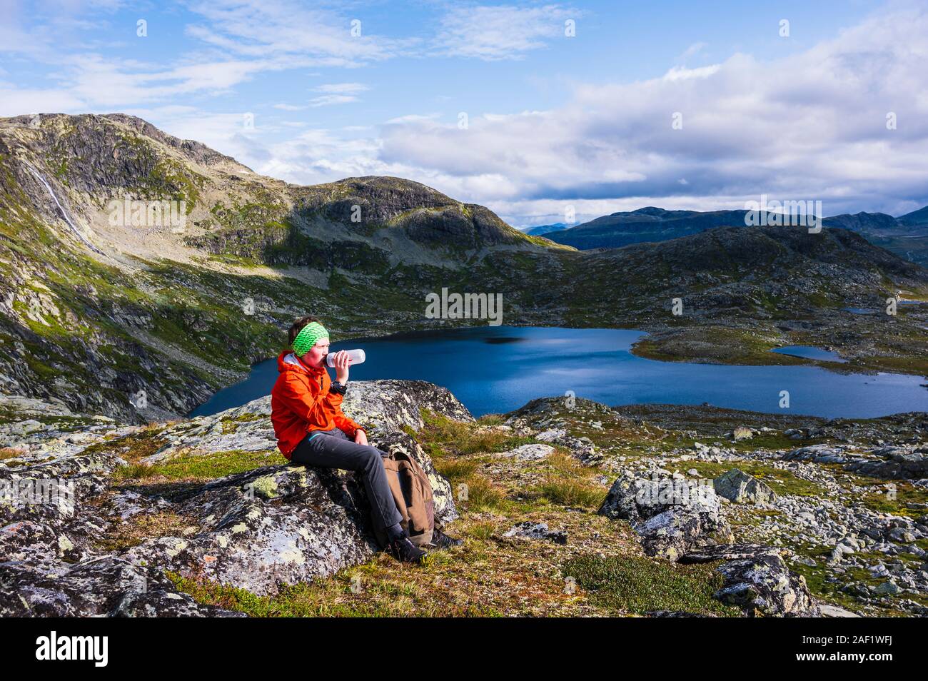 Female hiker resting Stock Photo - Alamy