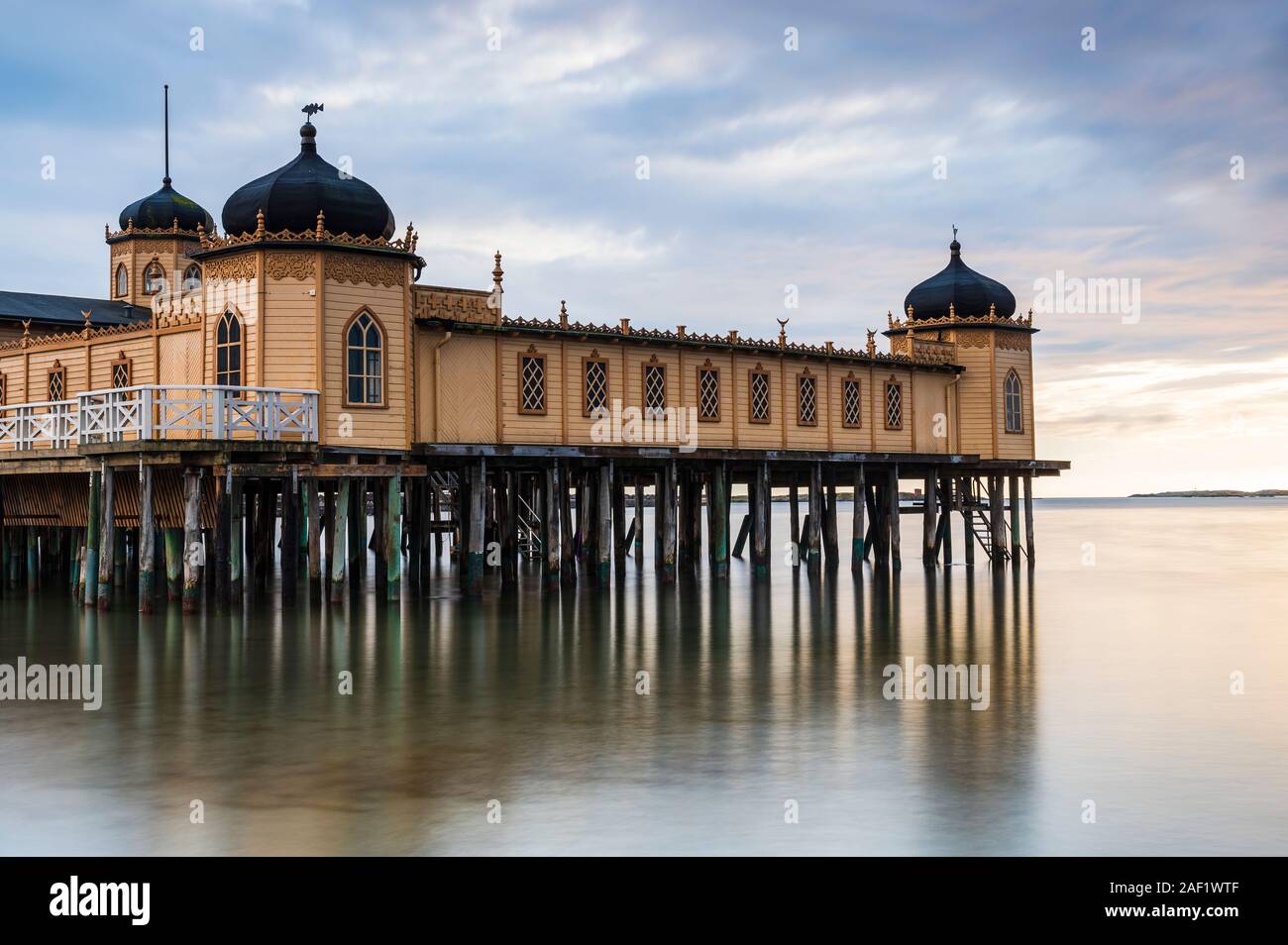 Pier with wooden building Stock Photo - Alamy