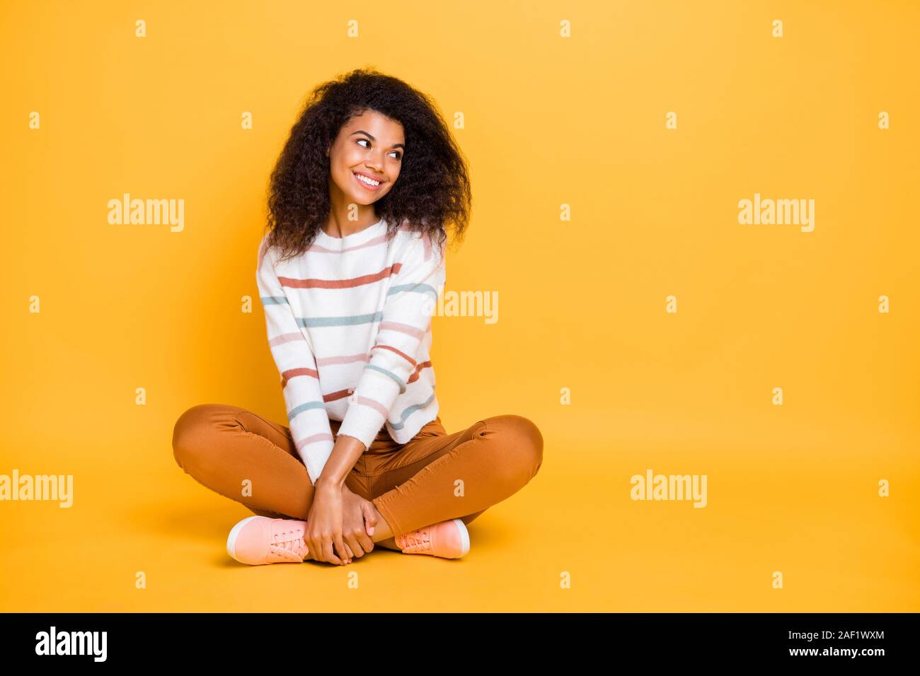 Woman sitting folded legs on hi-res stock photography and images - Alamy