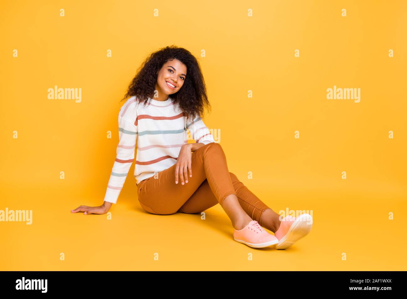 Full length body size photo of attractive glad positive with toothy ...