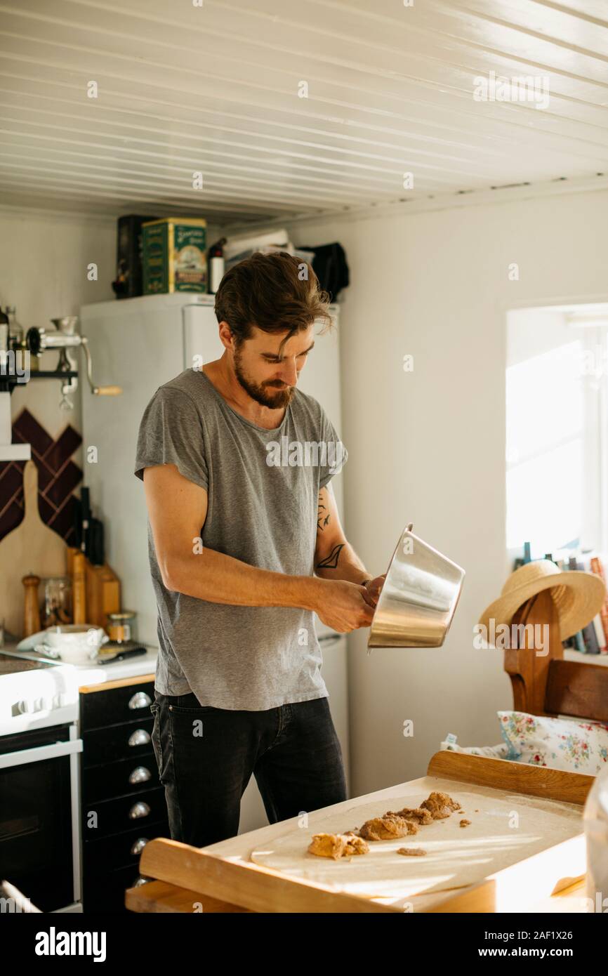 Man preparing dough Stock Photo - Alamy