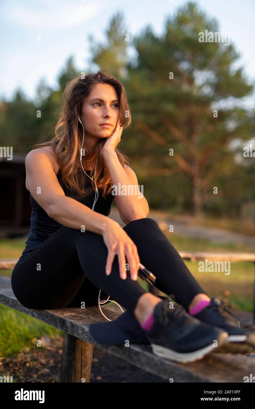 Woman on bench hi-res stock photography and images - Alamy