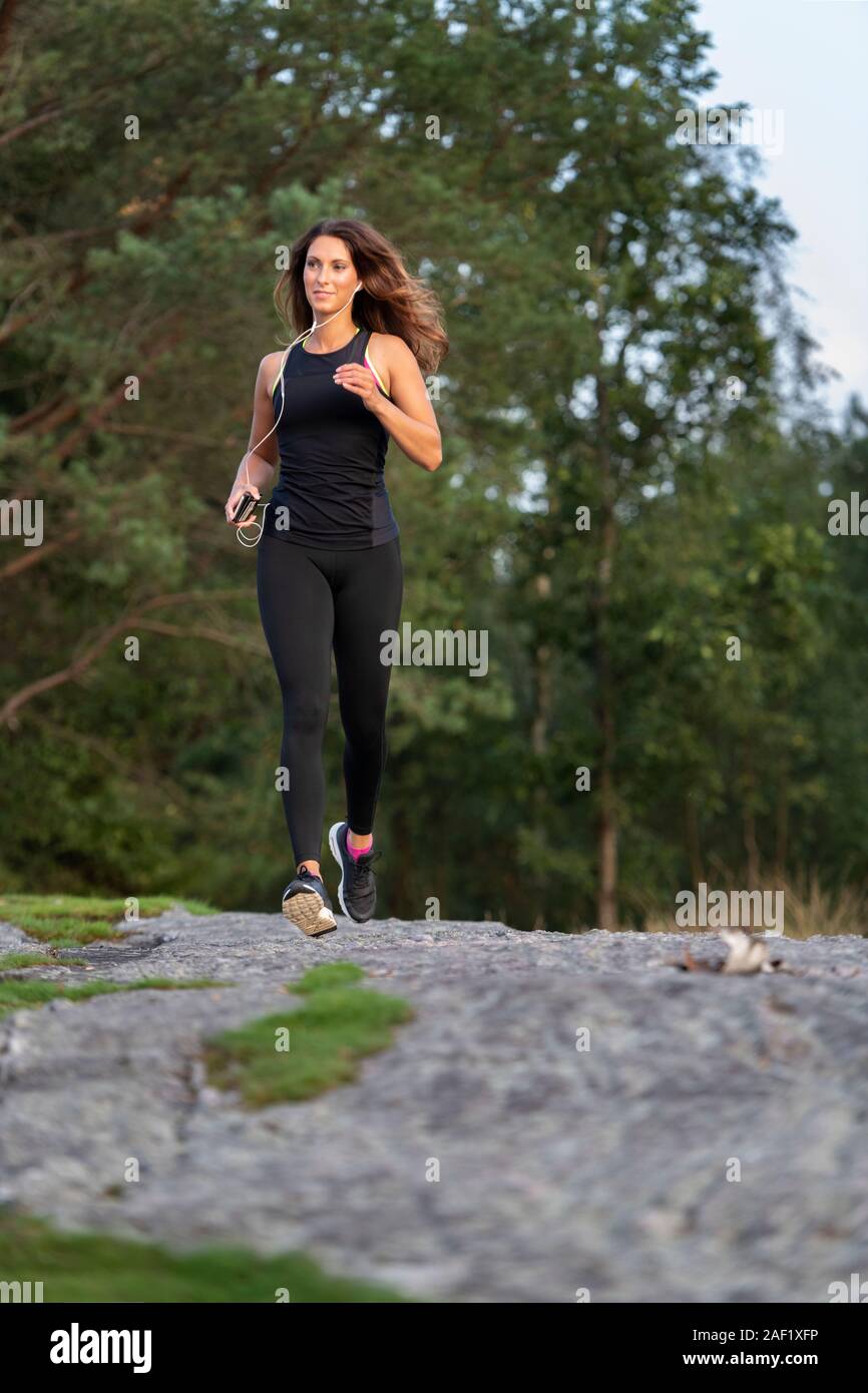Woman jogging low angle hi-res stock photography and images - Alamy