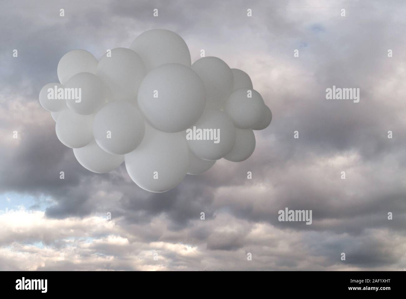 White helium balloons on a cloudy sky background Stock Photo - Alamy
