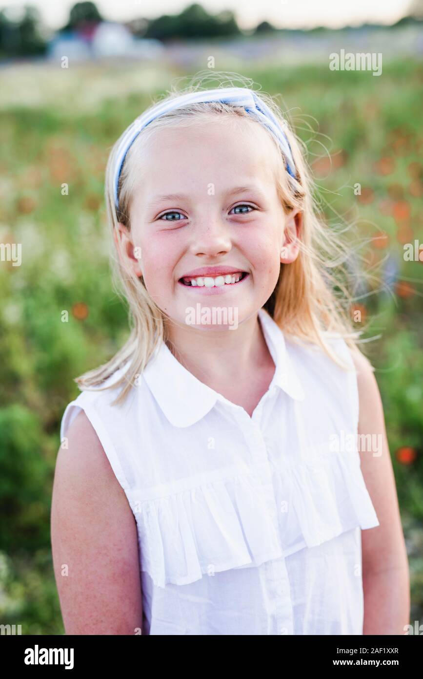 Portrait of smiling girl Stock Photo - Alamy