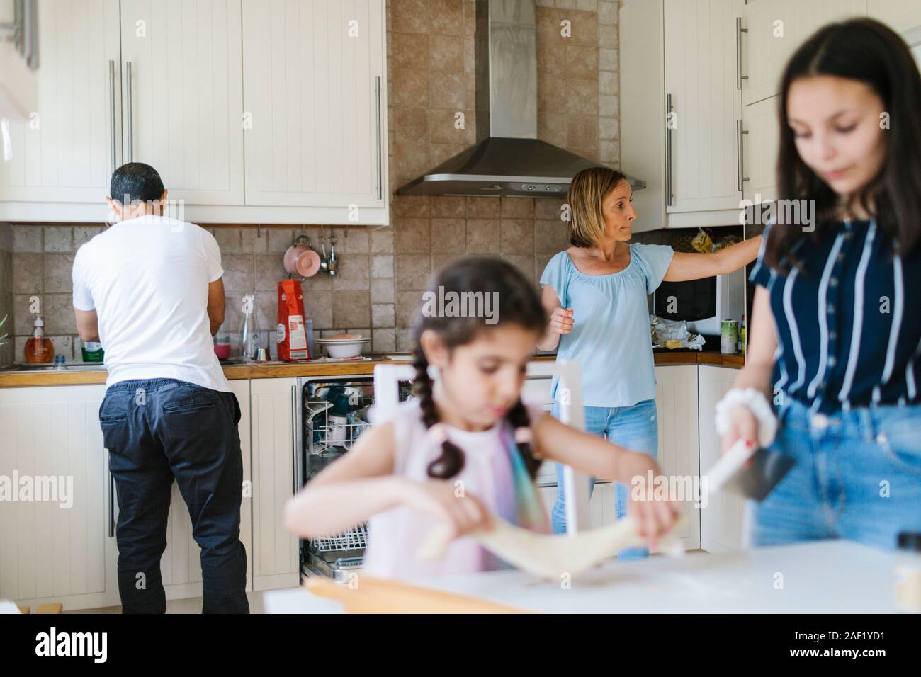 Domestic task family hi-res stock photography and images - Alamy