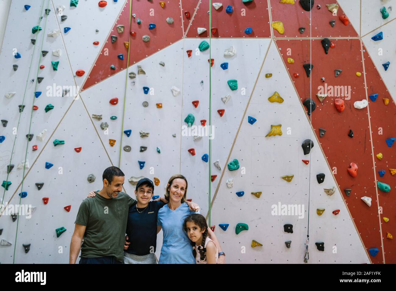 Family in climbing gym Stock Photo - Alamy