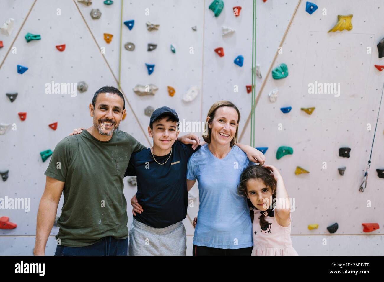 Family in climbing gym Stock Photo - Alamy
