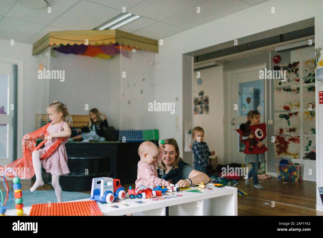Children playing in playschool Stock Photo - Alamy