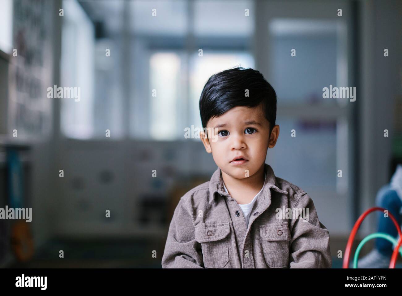 Boy looking at camera Stock Photo - Alamy
