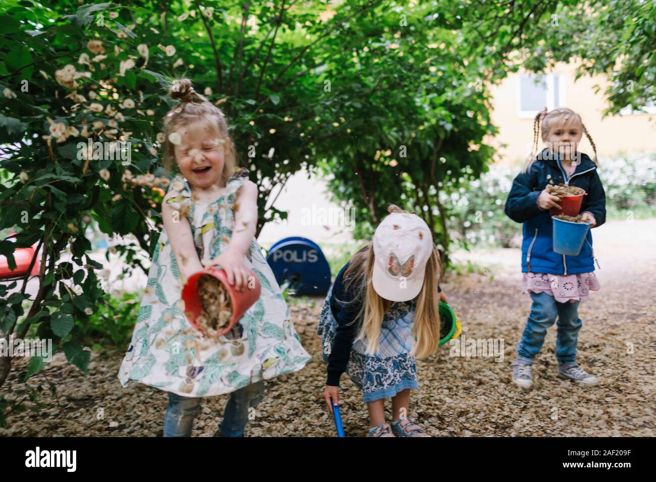 Girls playing outside Stock Photo - Alamy