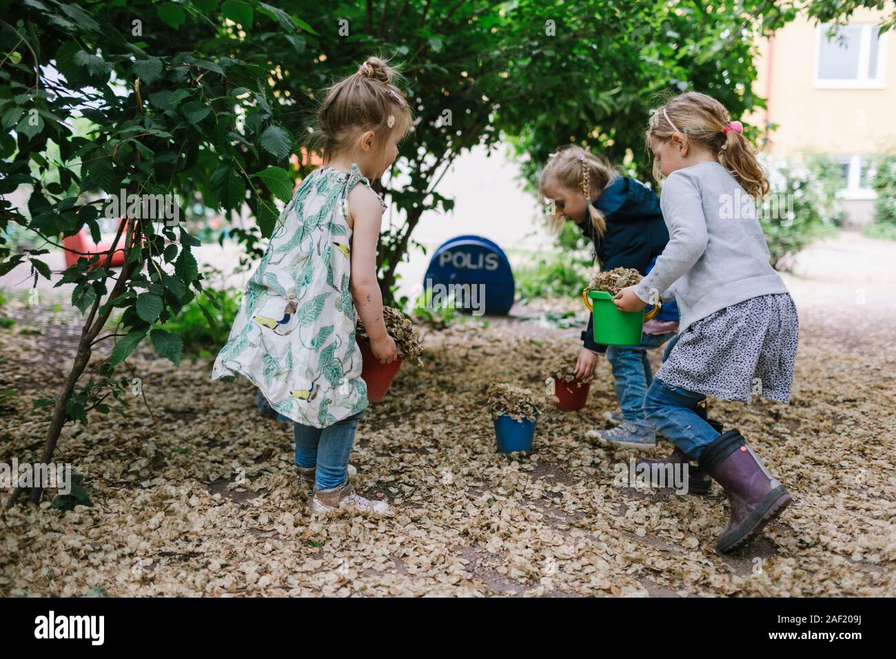 Girls playing outside Stock Photo - Alamy