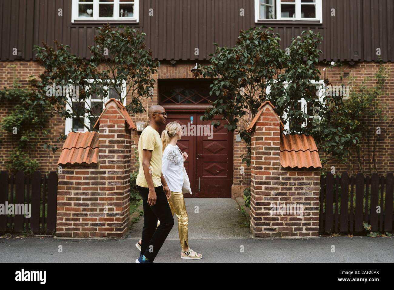 Man walking woman home hi-res stock photography and images - Alamy