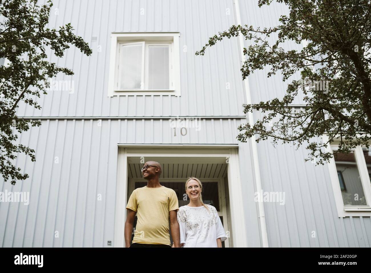 House building together hi-res stock photography and images - Alamy