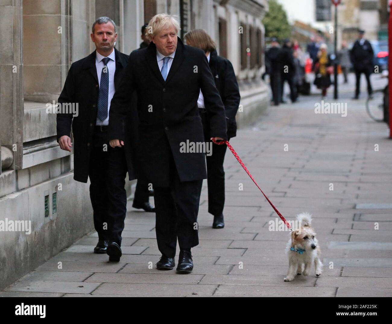 Prime Minister Boris Johnson arrives with his dog Dilyn to cast his ...