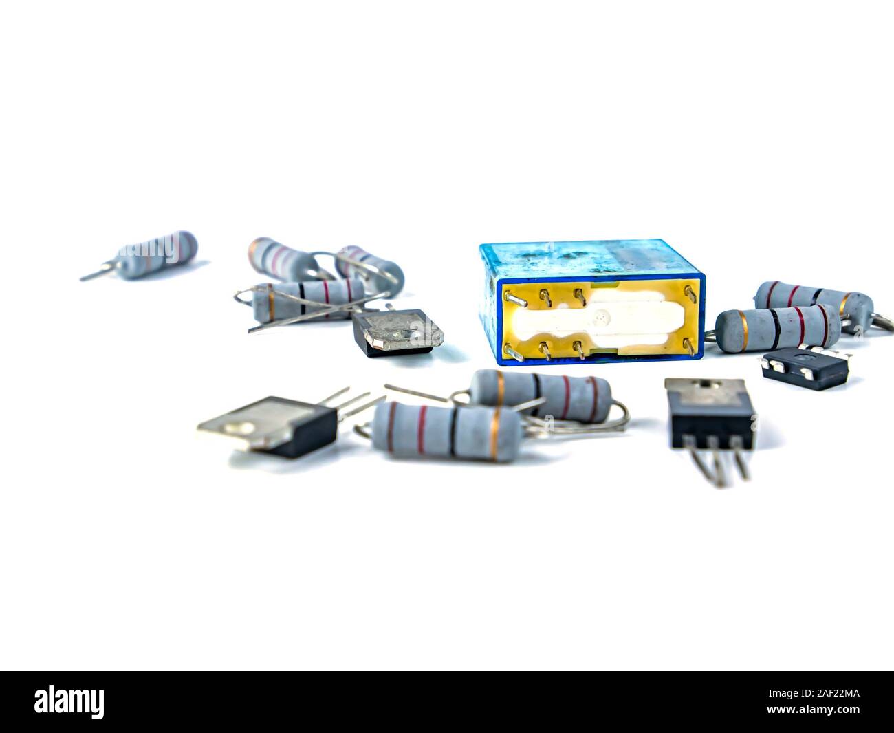 Electronic parts on a white background with place for text. Capacitor ...