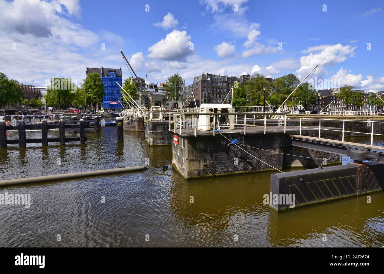 Amsterdam, Holland, August 2019. The dam on the Amstel river. Metal ...