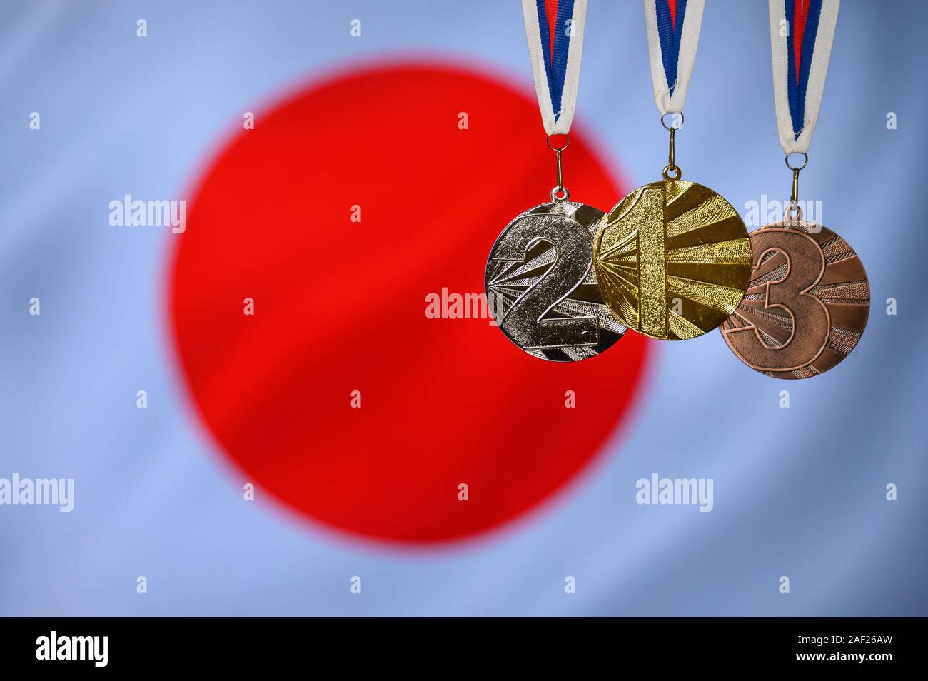 Silhouette of tree medal: Gold, Silver an Bronze. Japan flag in ...