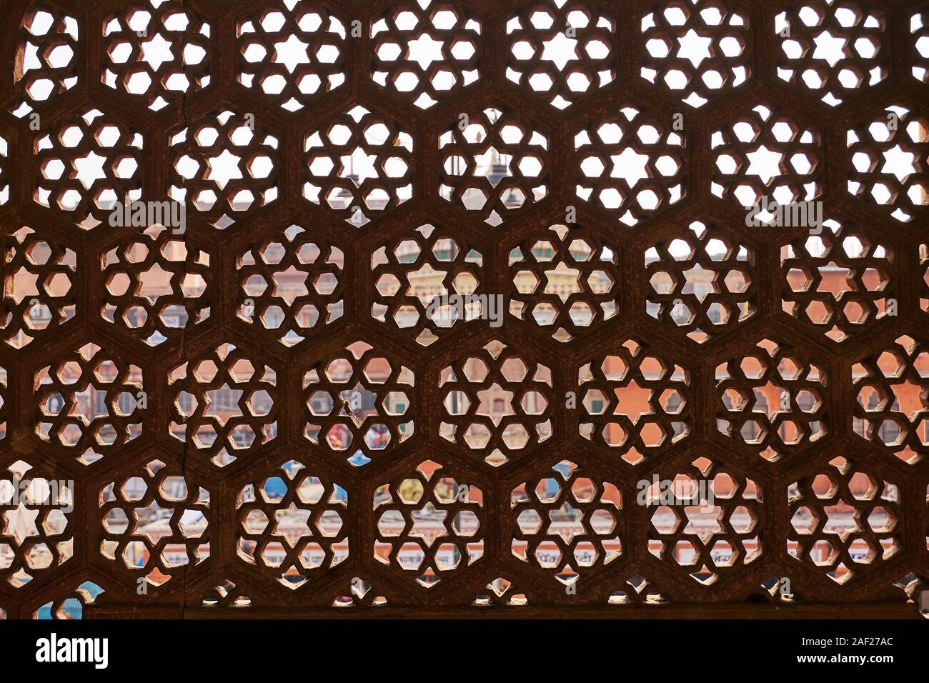 Indian or arabic window pattern. Window with many holes Stock Photo - Alamy