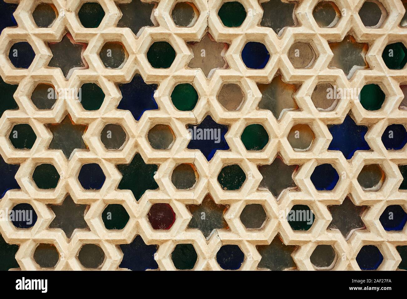 Indian or arabic window pattern. Window with many holes Stock Photo - Alamy