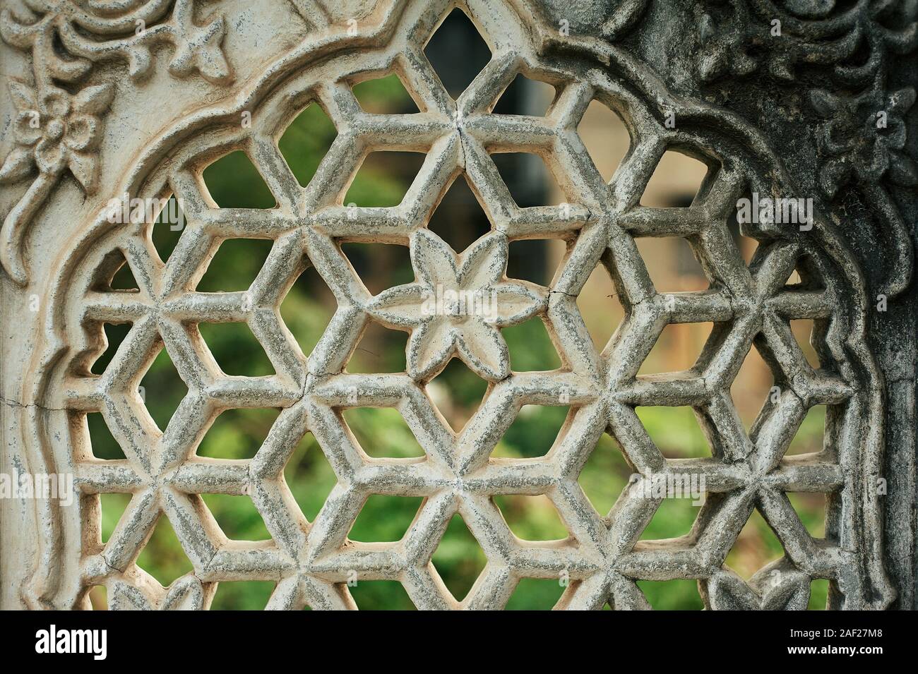 Indian or arabic window pattern. Window with many holes Stock Photo - Alamy