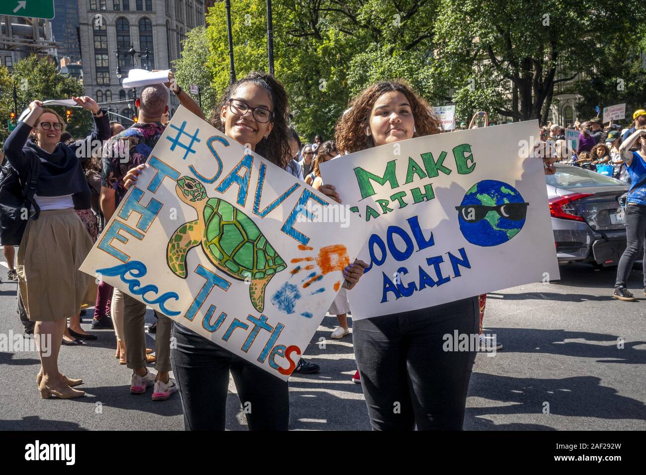 With slogans like "Save the Turtles" and "Make earth cool again ...