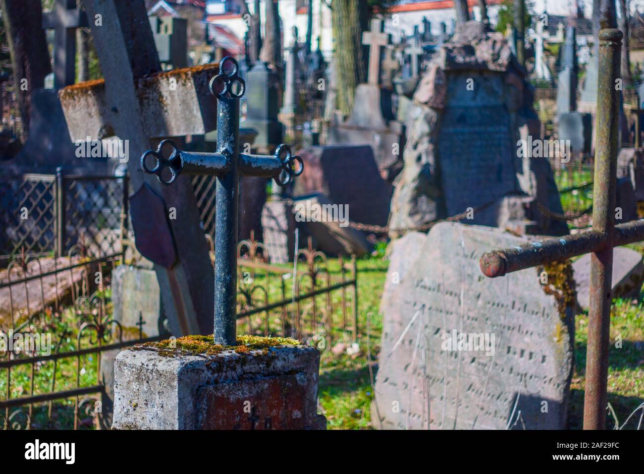 graves and crosses in old cemetery Stock Photo - Alamy