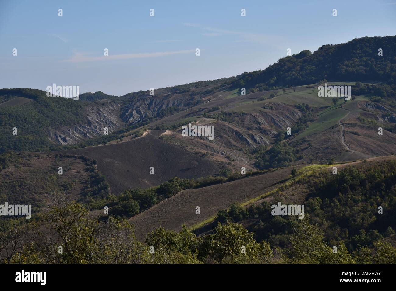 Clay formations of badlands in the hill of the Reggiano Apennines Stock ...