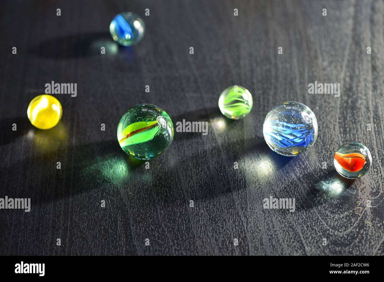 Single yellow glass marble hi-res stock photography and images - Alamy