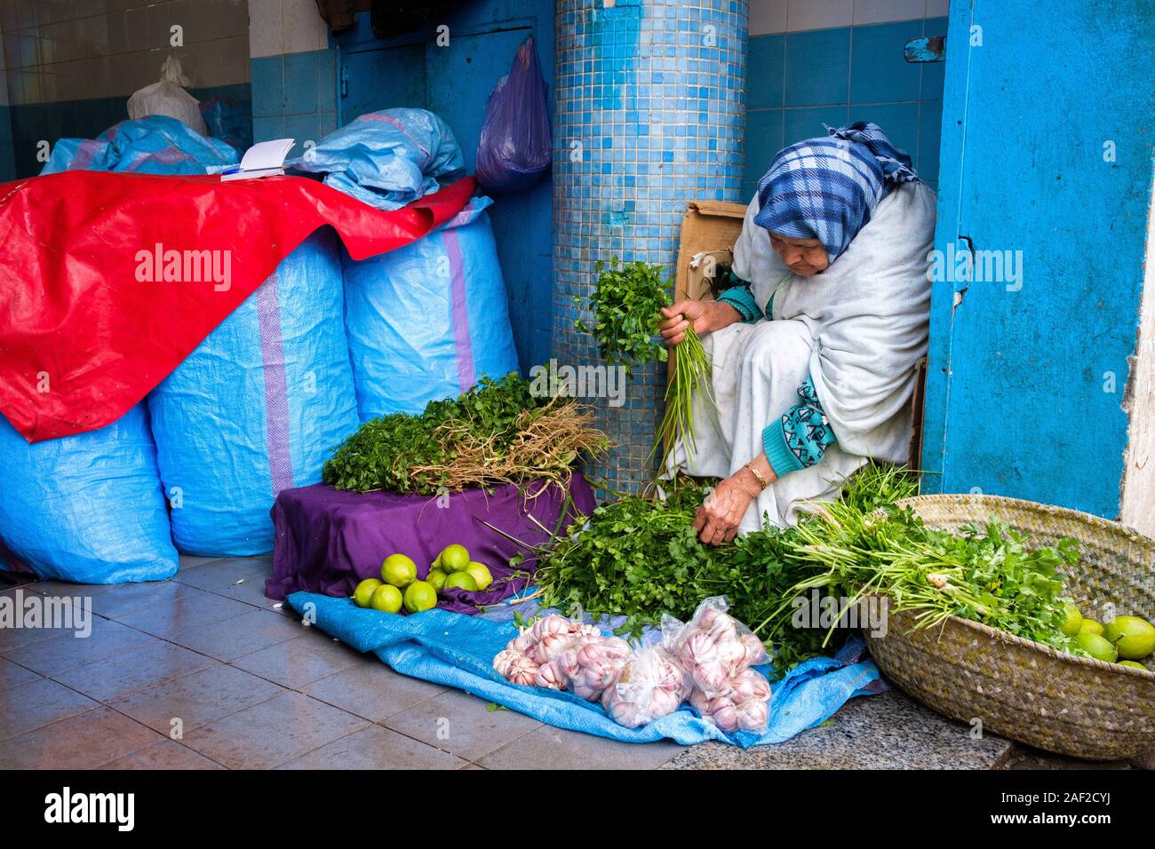 Morocco, Tangier: woman, vegetable seller, in the medina Stock Photo ...