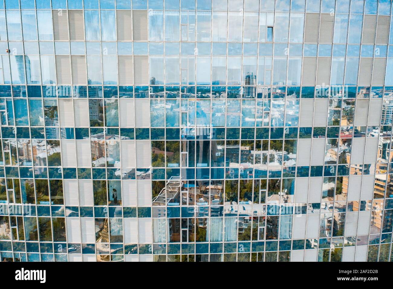 Street reflection on glass steel building facade Stock Photo - Alamy
