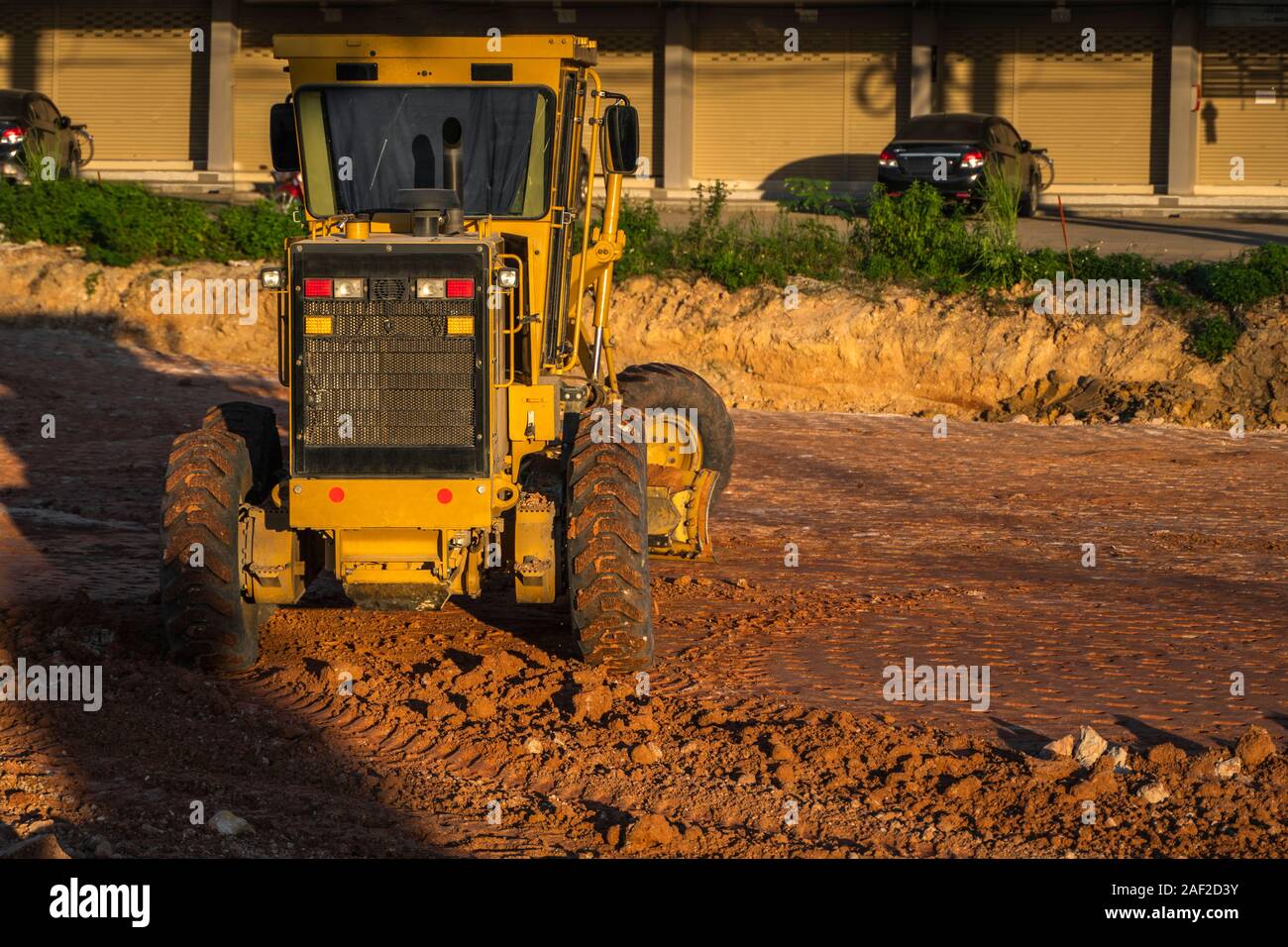 Grader is working on road construction. Grader industrial machine on ...