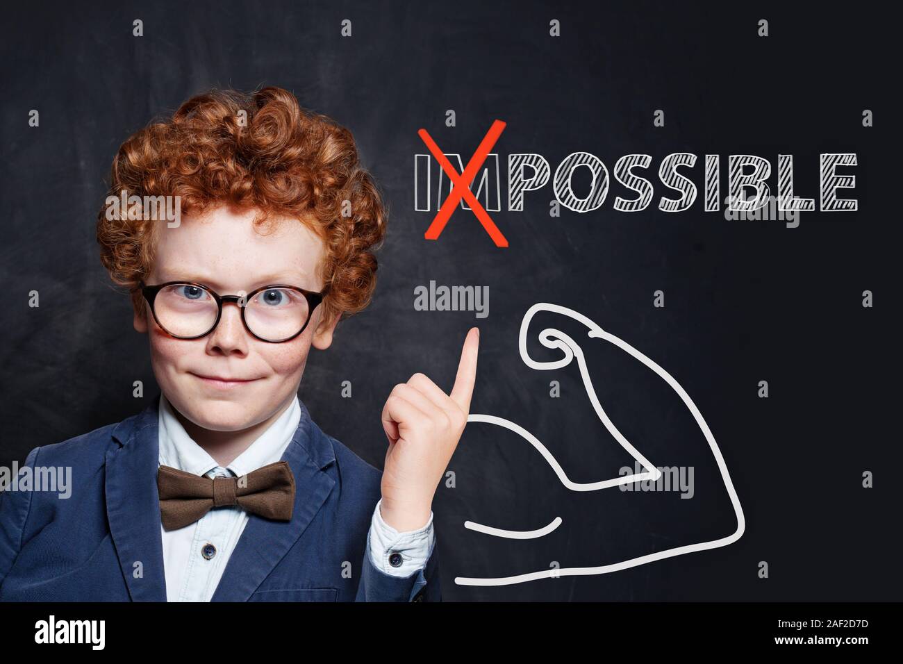 Funny smart kid and text possible on blackboard background. Success and ...