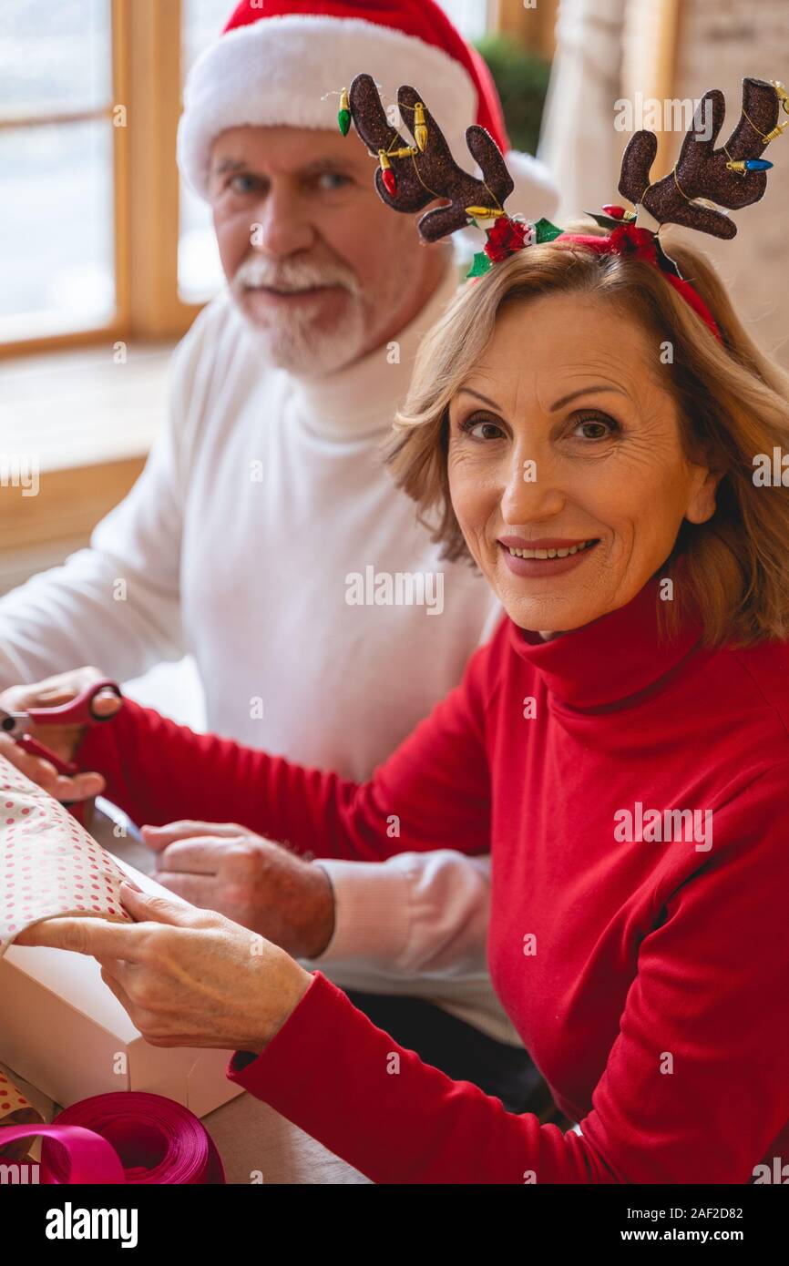 Two mature people looking straight at camera Stock Photo - Alamy