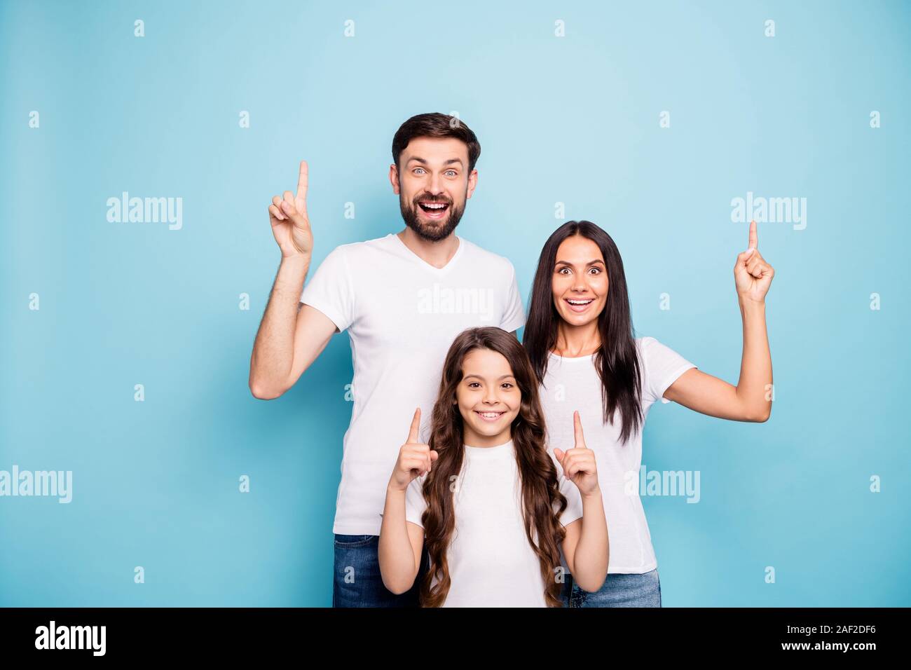 Portrait of surprised funky three people promoters scream wow omg point ...