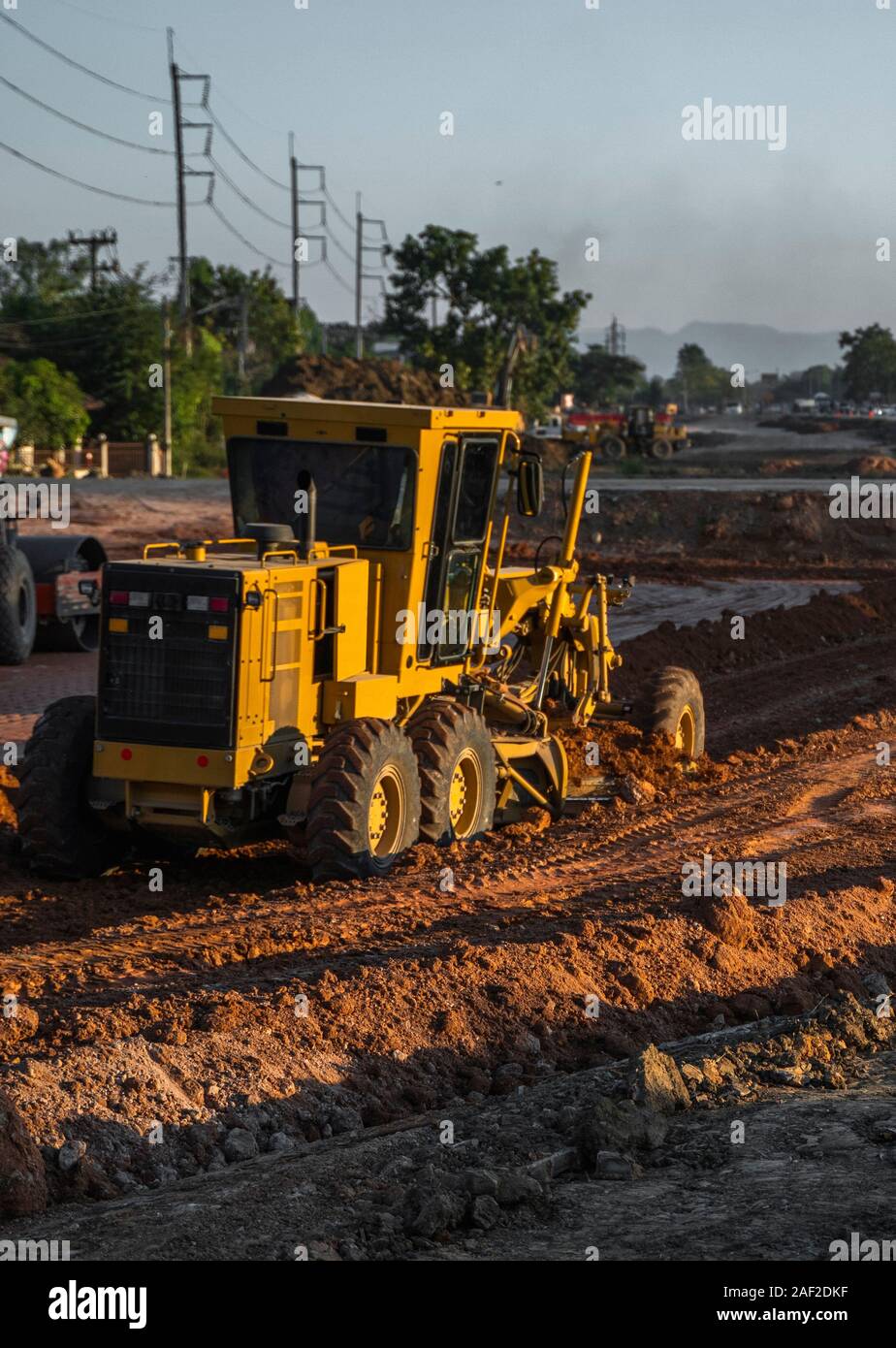 Grader is working on road construction. Grader industrial machine on ...