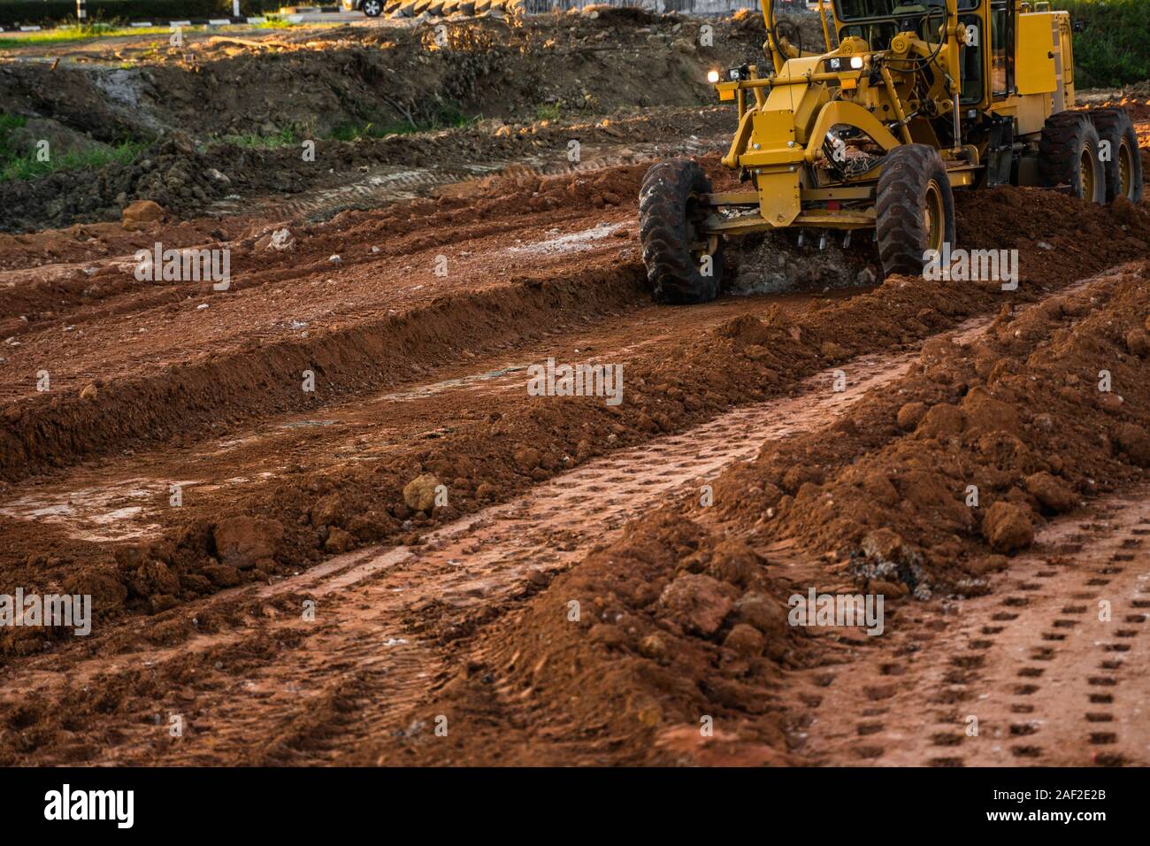 Grader is working on road construction. Grader industrial machine on ...