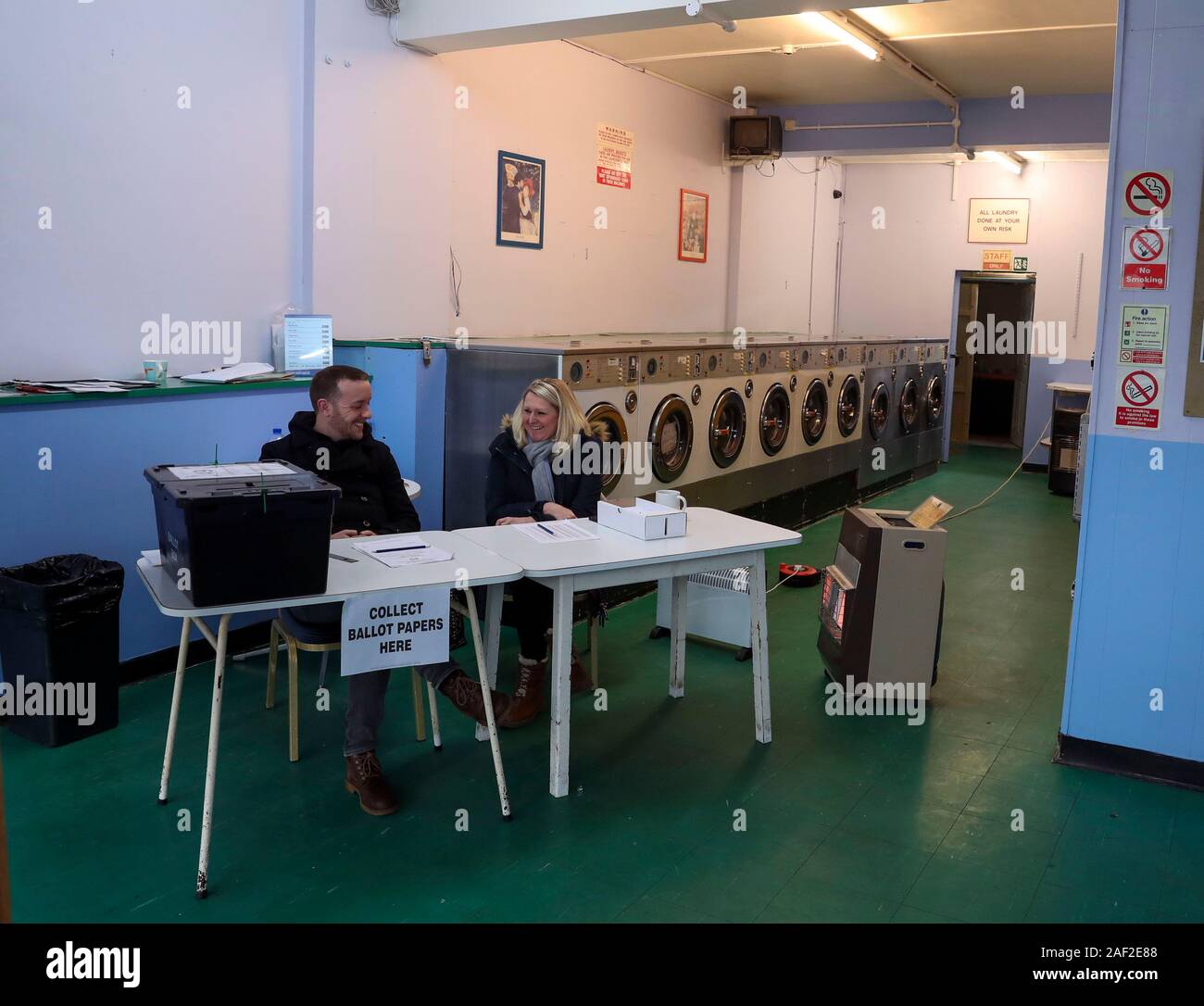 The presiding officer and a polling clerk at the polling station in the ...