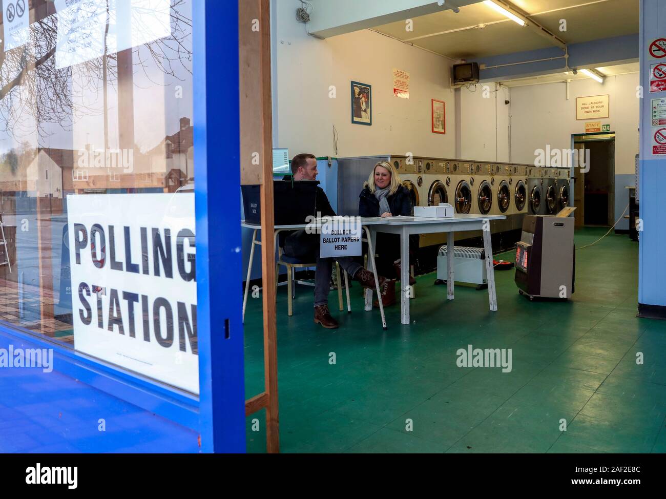 The presiding officer and a polling clerk at the polling station in the ...