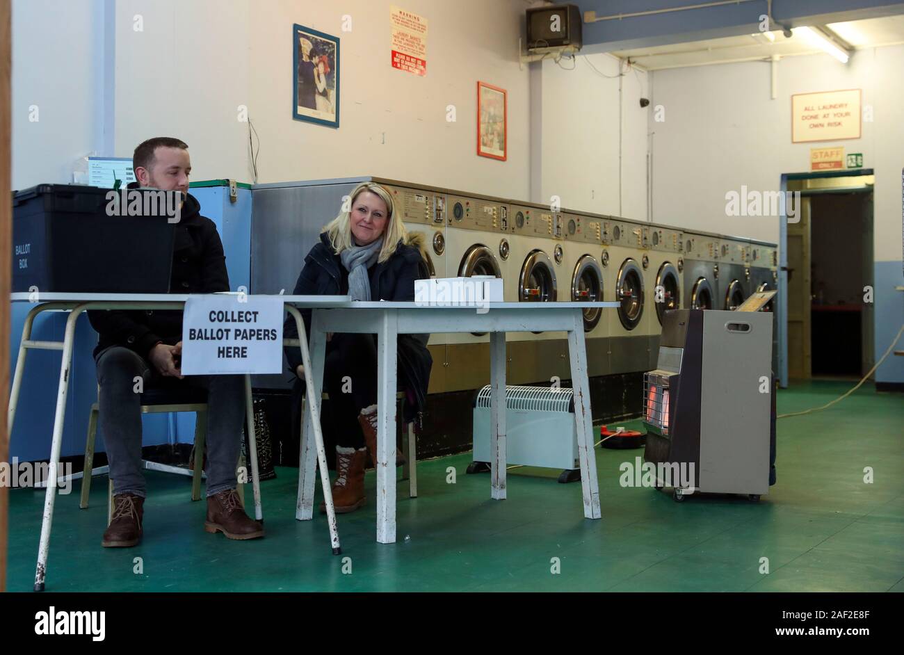 The presiding officer and a polling clerk at the polling station in the ...