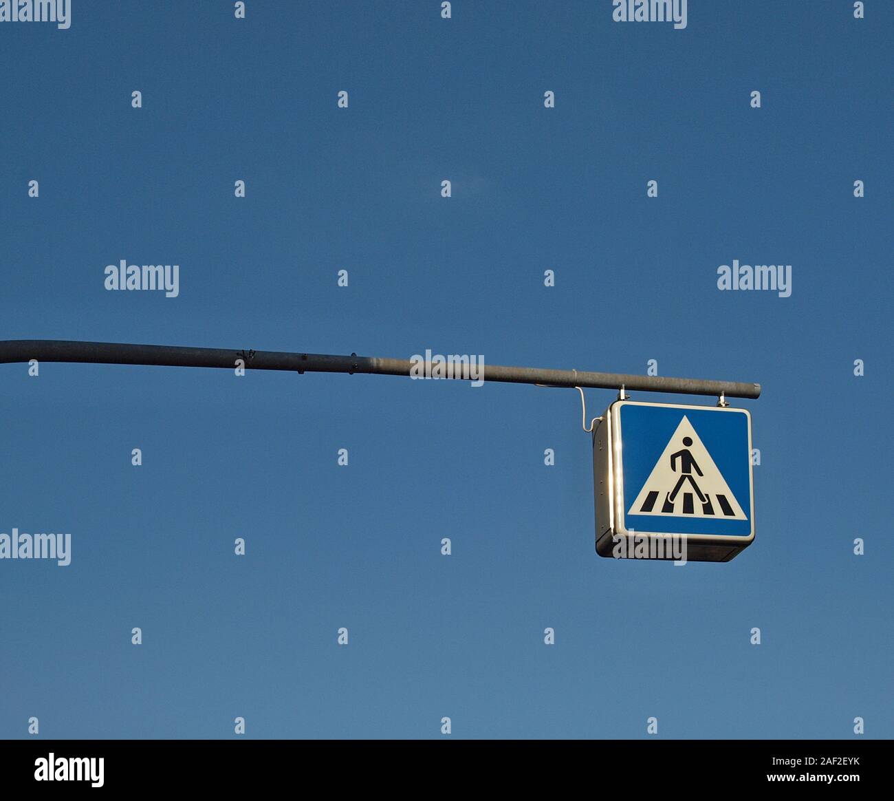 Road sign zebra crossing in front of blue sky Stock Photo - Alamy