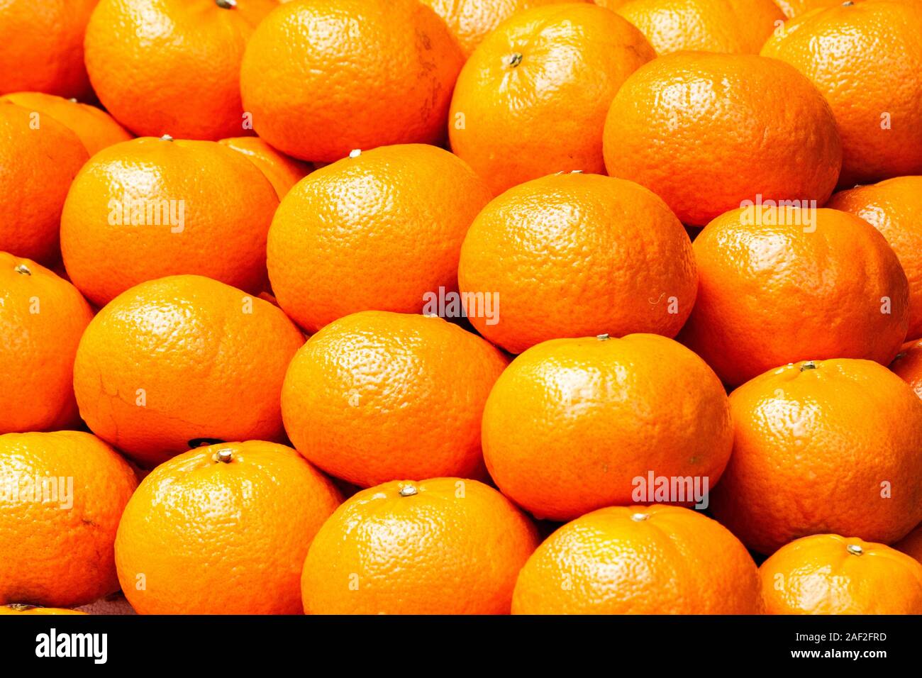 Oranges for sale on a market stall in Bangkok Stock Photo - Alamy